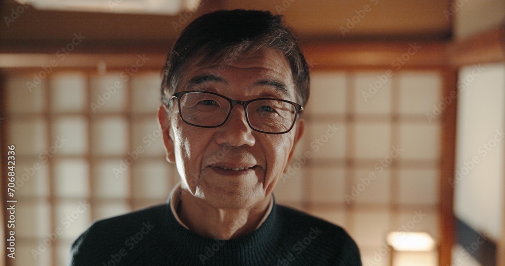 Smile, portrait and senior Japanese man at his home with positive, good ...