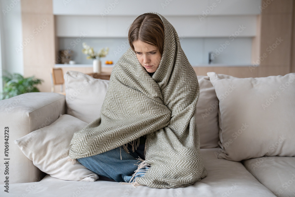 Desperated depressed woman crying sitting on couch with closed eyes ...