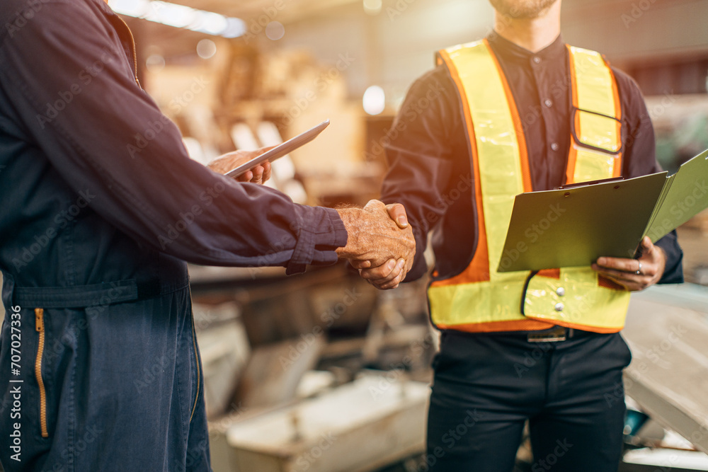 Engineer Team dealing cooperation shaking hand together. Engineering ...