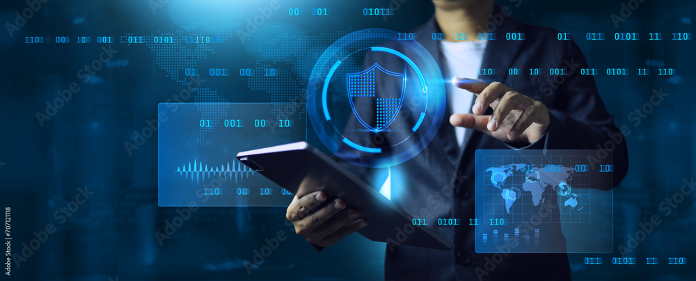Cyber security concept with businessman touch on shield on tablet ...