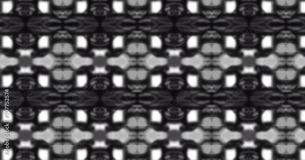 Black and white repetitive reflection map of a small black box kind of ...