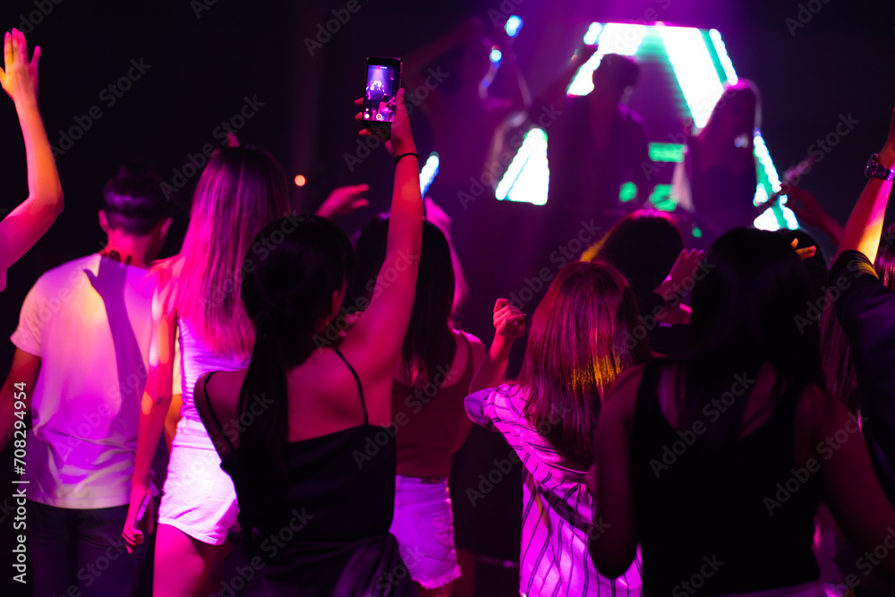 Audience Captures the show with smartphone. music concert live on stage ...