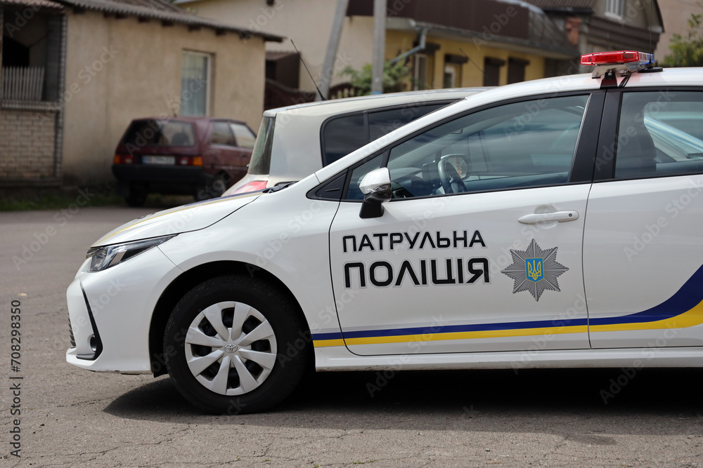 TERNOPIL, UKRAINE - JULY 7, 2023 Ukrainian patrol police white car with ...