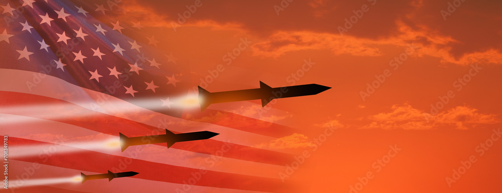Fired missiles fly to the target. USA flag. Missiles at the sky at ...