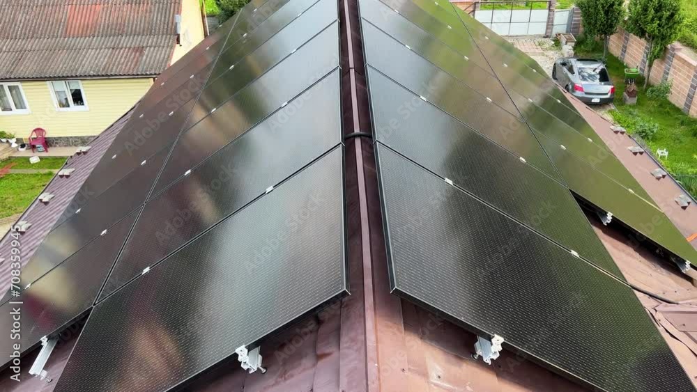 Solar photovoltaic panel system on modern house rooftop. Solar ...