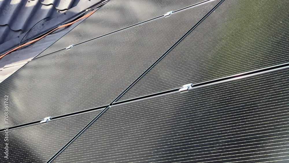 Solar photovoltaic panel system on modern house rooftop. Solar ...