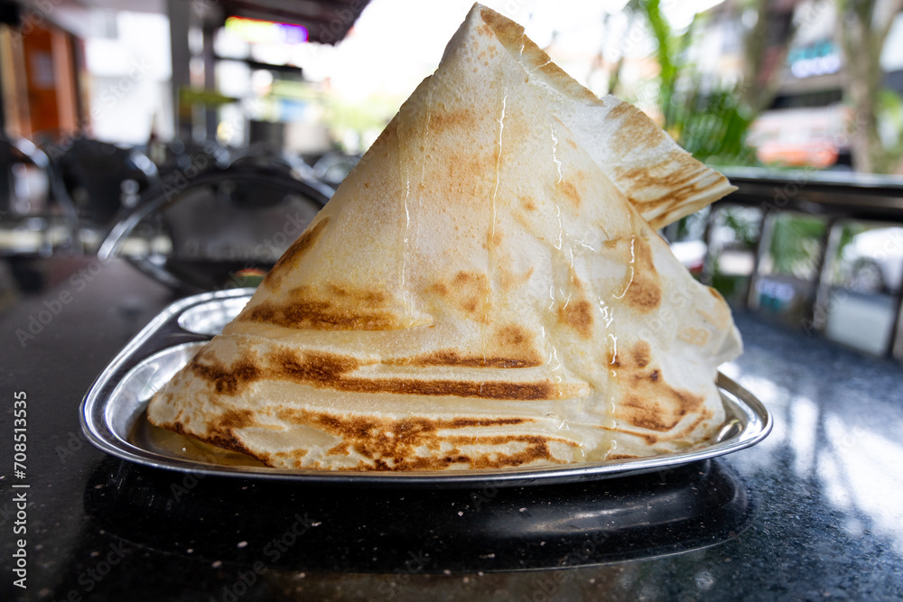 Roti Tisu or Tissue Bread is crunchy form of bread served at mamak ...