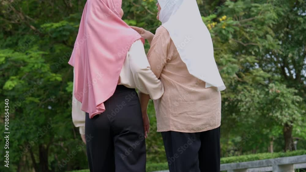 Muslim careful caregiver or nurse taking care of the patient in the ...