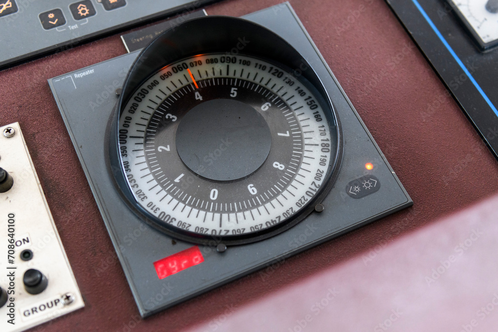 Gyro compass repeater on the navigational control pane of navigational ...