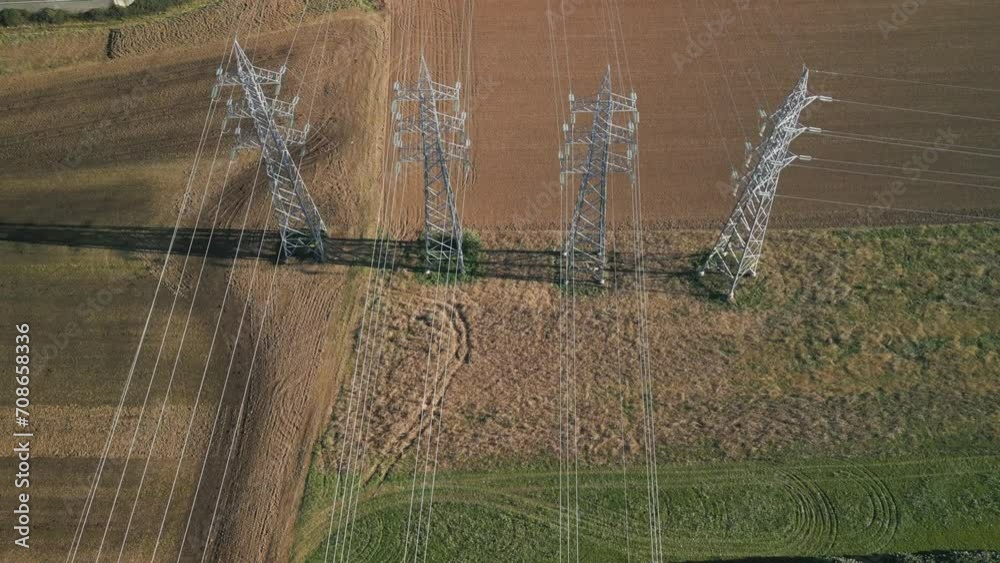 Top view of transmission towers near a electrical substation. A steel ...