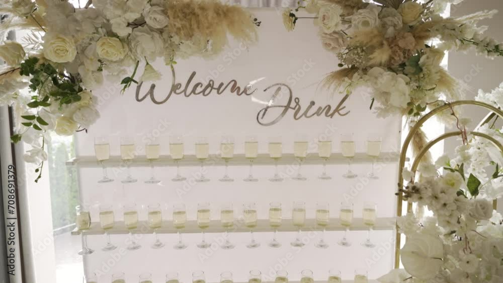 Welcome drinks station at a festive event Elegant champagne glasses ...