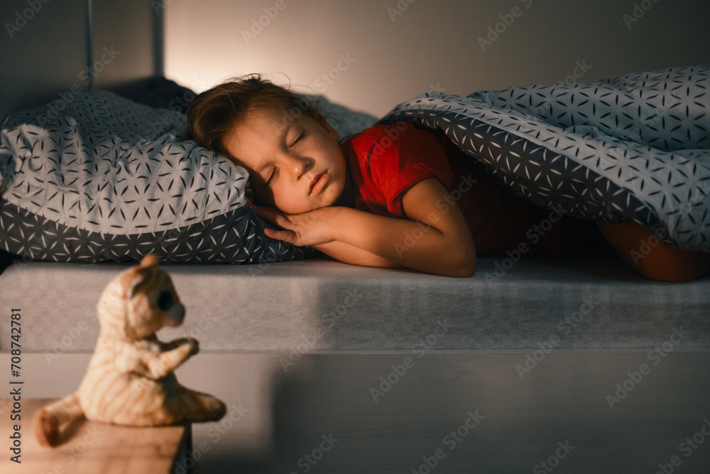 Child sleeping at night. Comfortable bed for kids. Toddler girl ...