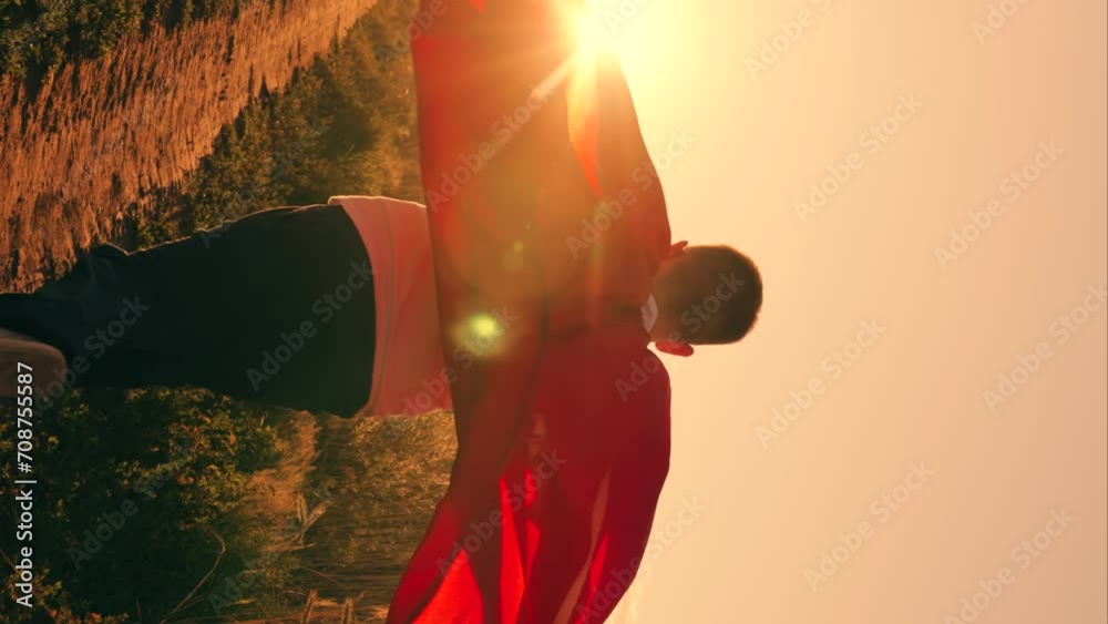 Super Kid runs across field with wheat, childhood dream to fly. Boy ...