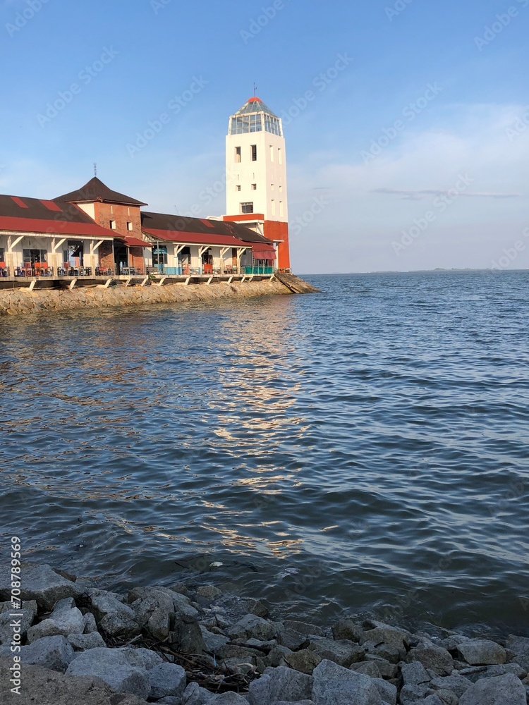 church in the sea, cone building above the sea in the coastal area ...