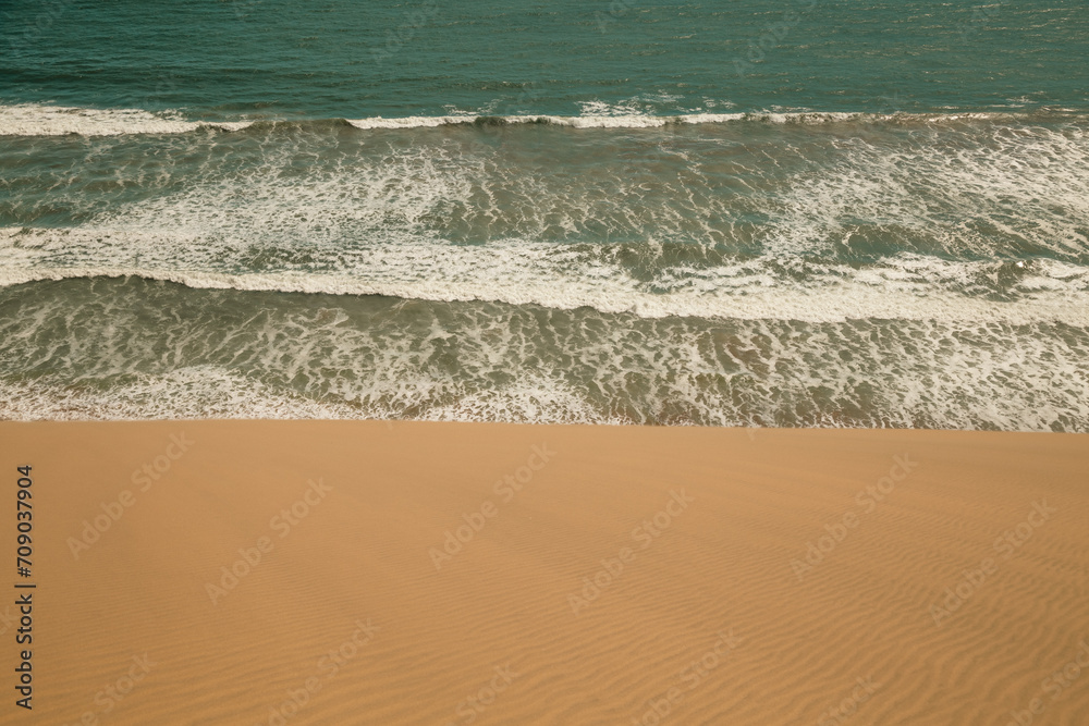 Poster Ocean meets the Sand dunes in Sandwich Harbour Historic, Namibia ...