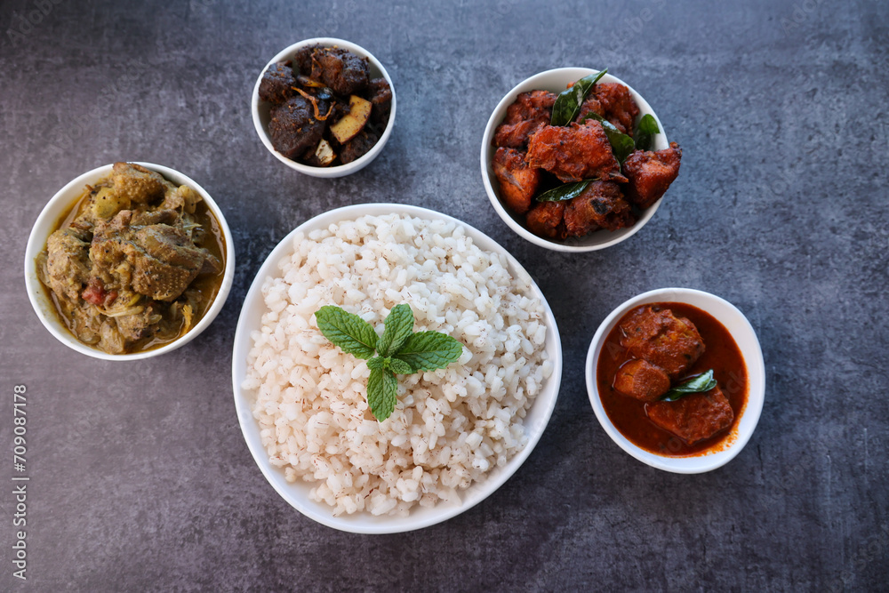 Kerala special food sadhya in banana leaf plate with Chicken fry Duck ...