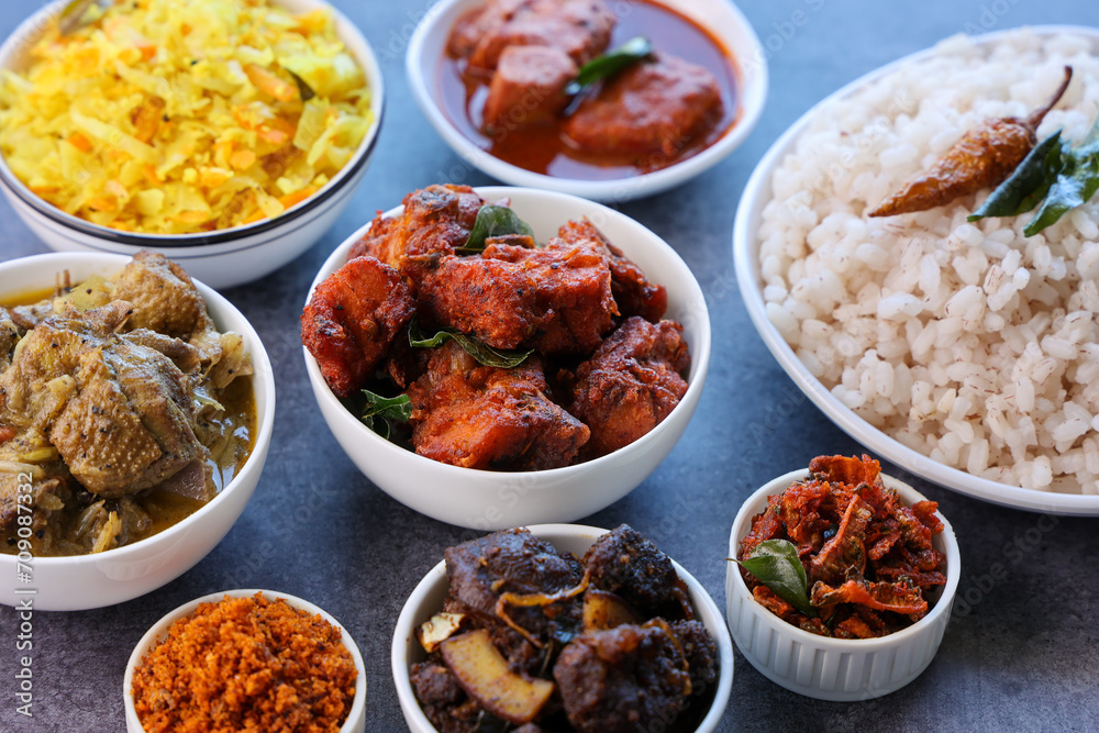 Kerala special food sadhya in banana leaf plate with Chicken fry Duck ...