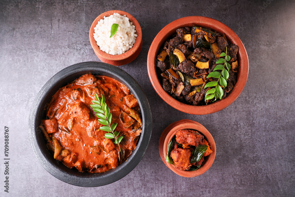 Kerala fish curry coconut milk gravy , cooking spicy Goan fish curry ...