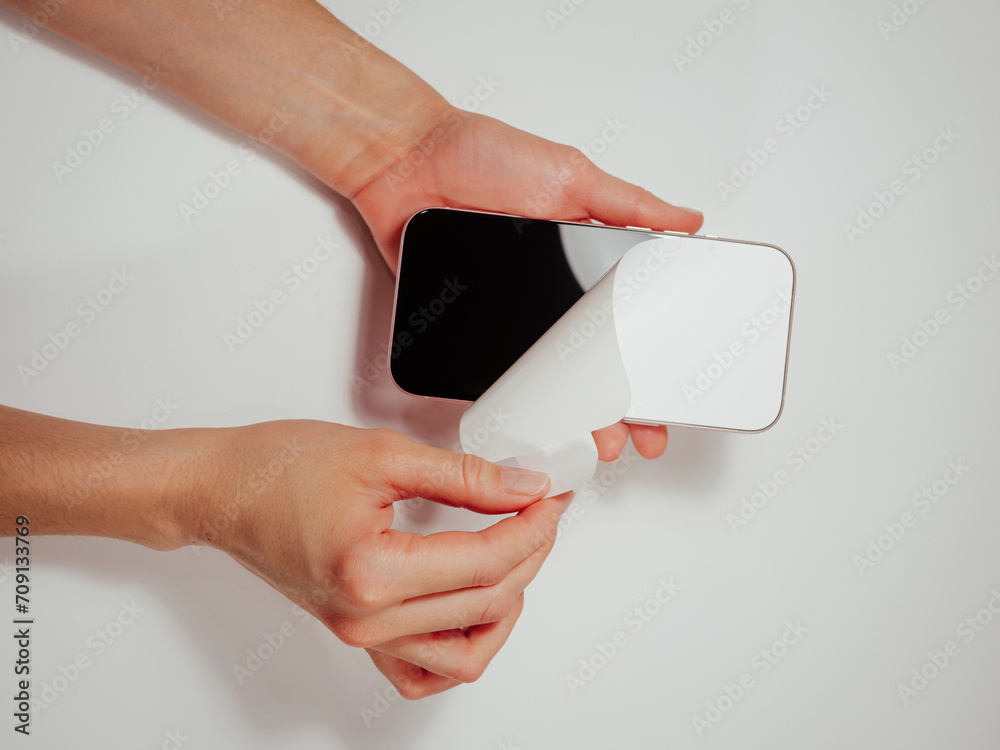 Latest new pink smartphone unbox in isolated white background. Woman ...