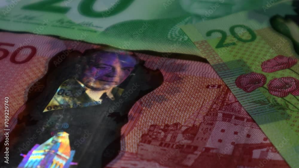 A still shot of Canadian banknote's security feature against ...