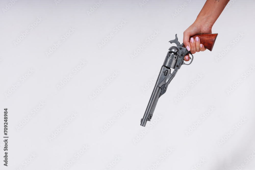 Female hand holding vintage black powder cap and ball revolver Stock ...