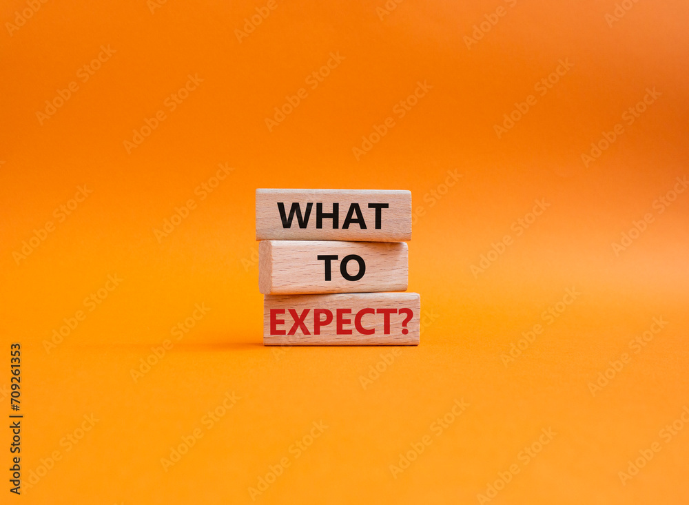 What to Expect symbol. Concept words What to Expect on wooden blocks ...