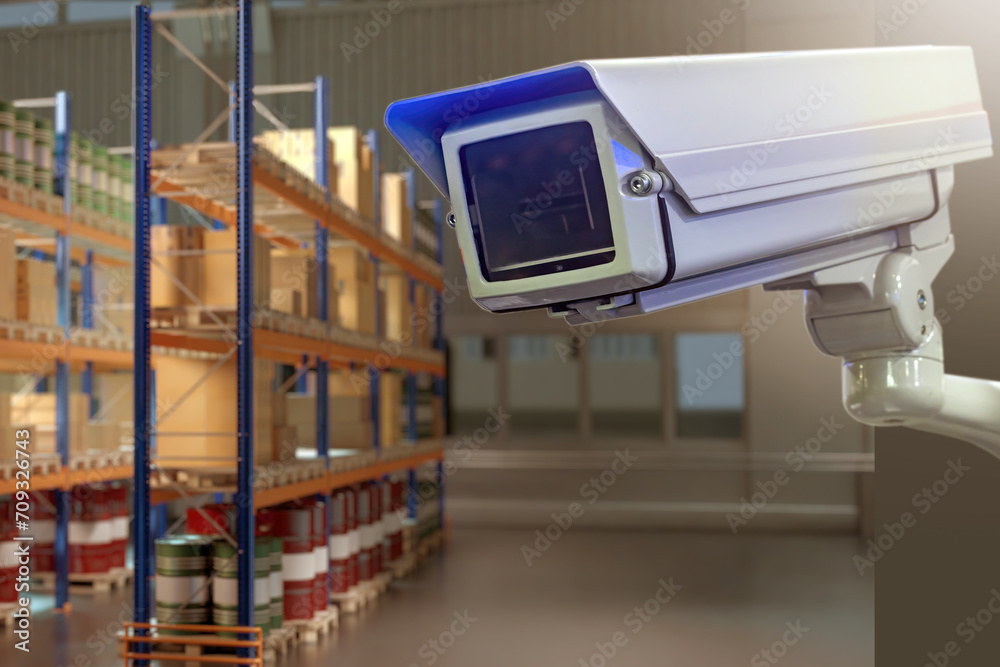 Surveillance camera in stock. CCTV system. Camera in storage area. CCTV ...