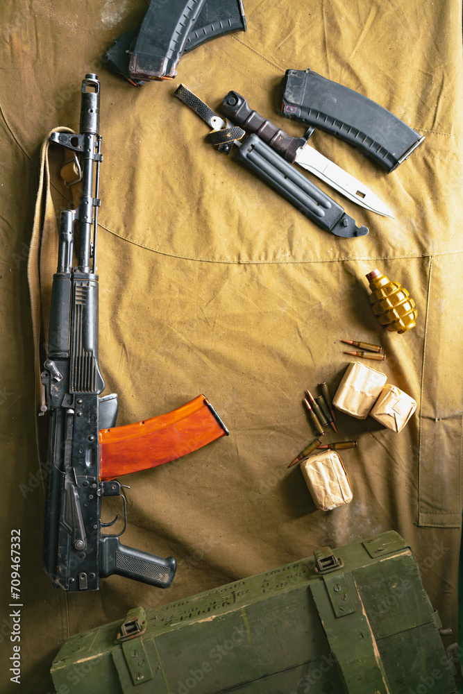 Kalashnikov assault rifle, cartridges, F-1 grenade and bayonet knife ...