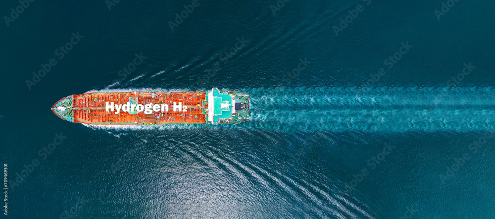 green energy . Hydrogen tanker ship. Red H2 Tanker runing in the ocean ...