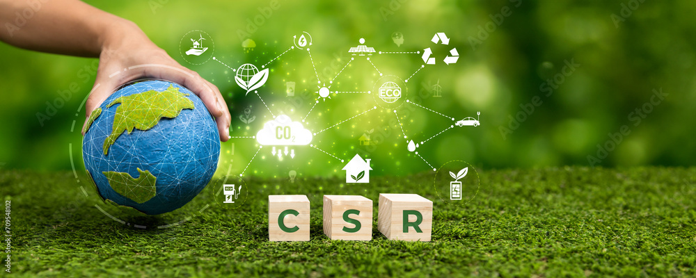 Businessman's hand holding Earth globe symbolize corporate commitment ...