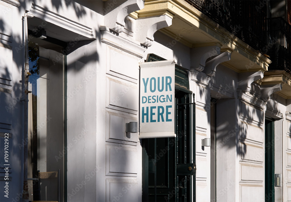 Mockup of customizable vertical sign outside shop building Stock ...