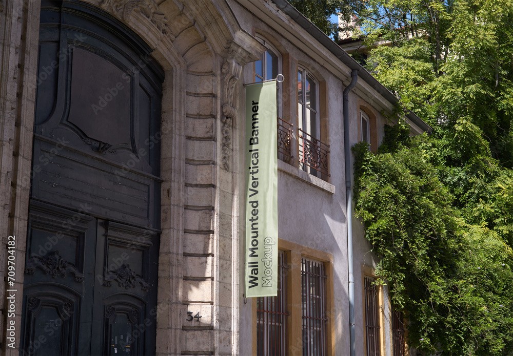 Mockup of customizable vertical sign hanging on building Stock Template ...