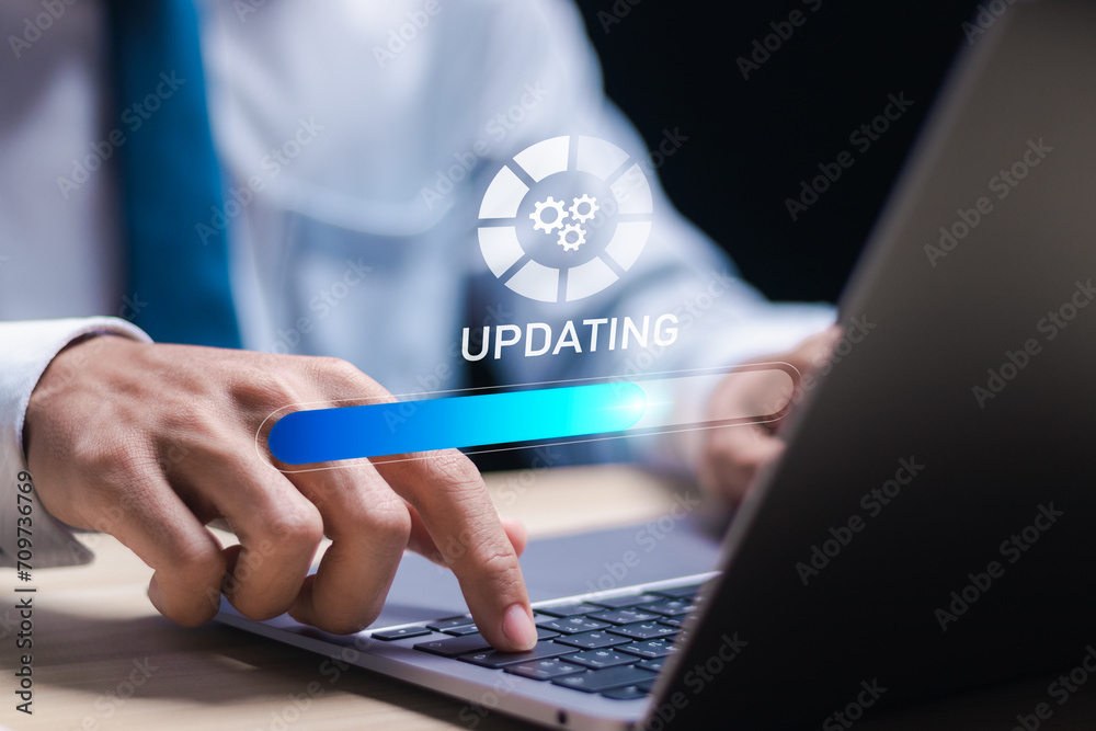 Person use laptop with virtual installing update bar. Software updates ...