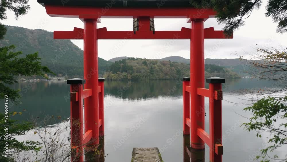 Hakone, Japan, flying through iconic torii gate on Lake Ashi. Hakone ...