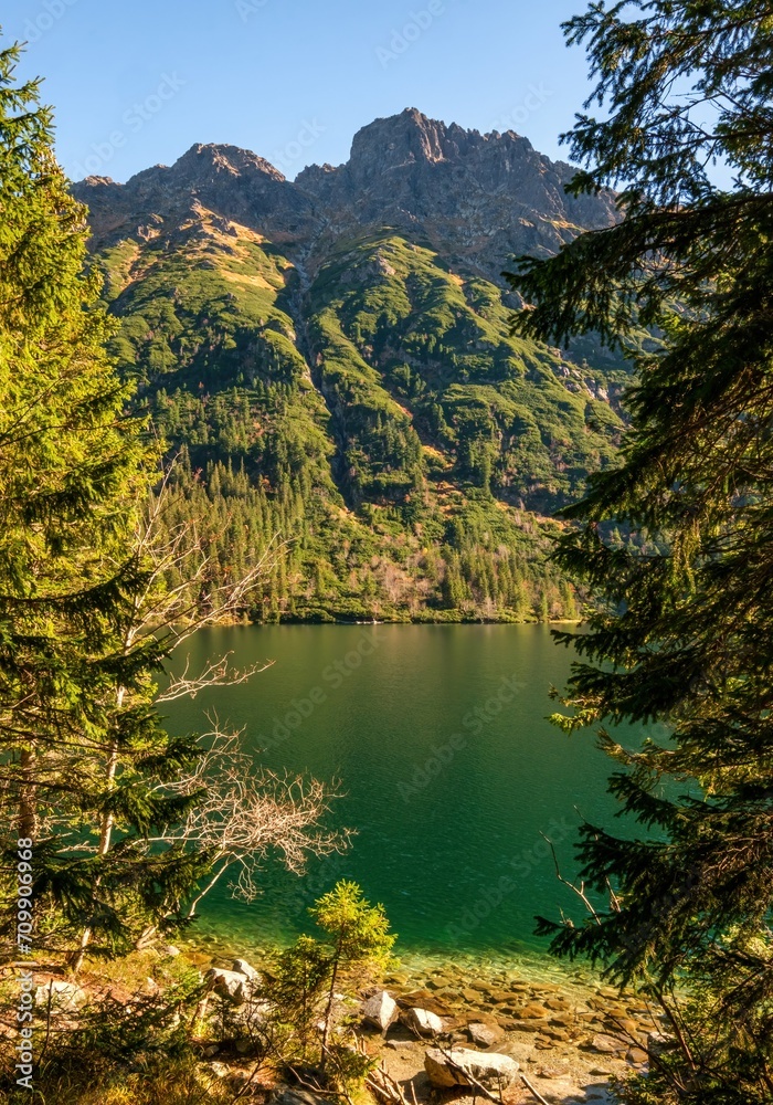 Beautiful, colorful mountain lake with an azure surface and mountain ...