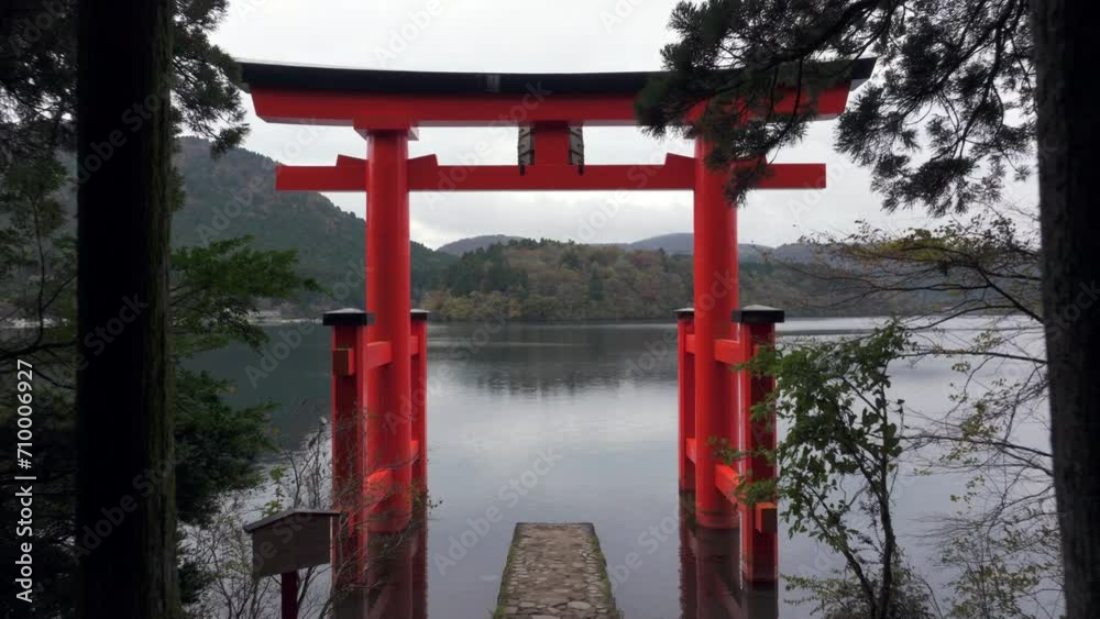 Hakone, Japan, flying through iconic torii gate on Lake Ashi. Hakone ...