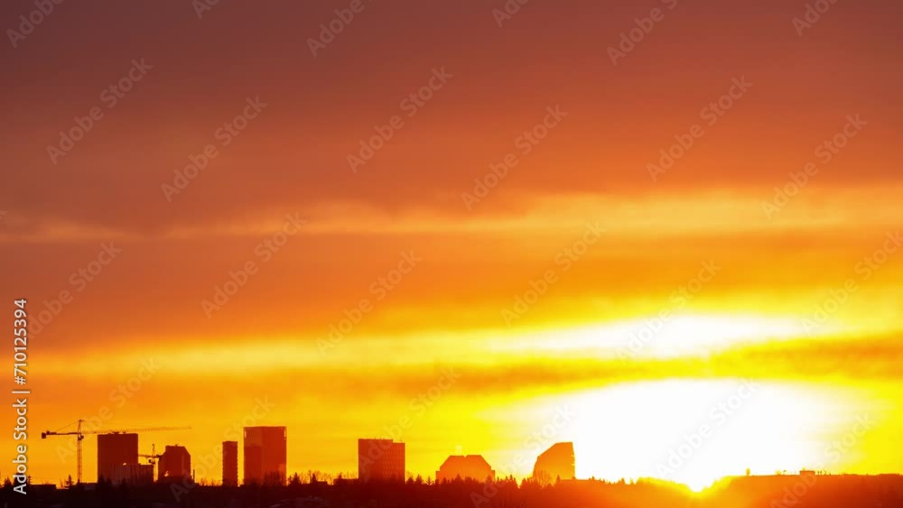Golden light sunrise at horizon above building. morning sun up from ...