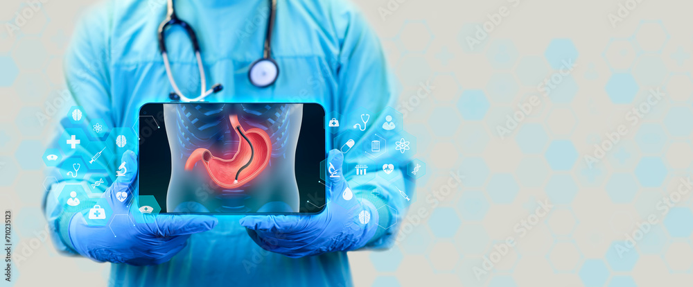 Endoscopic biopsy, esophagogastroduodenoscopy, EGD. The doctor shows ...