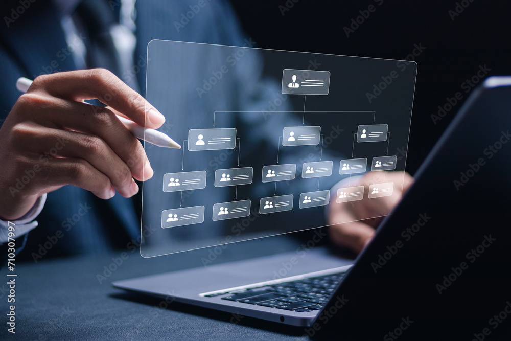 Businessman use laptop with workflow automation system with data diagram of hierarchical ...