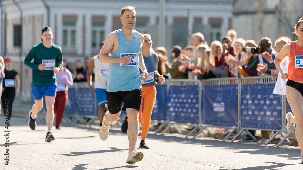 Happy Group of People Participating in a City Marathon. Diverse Race ...