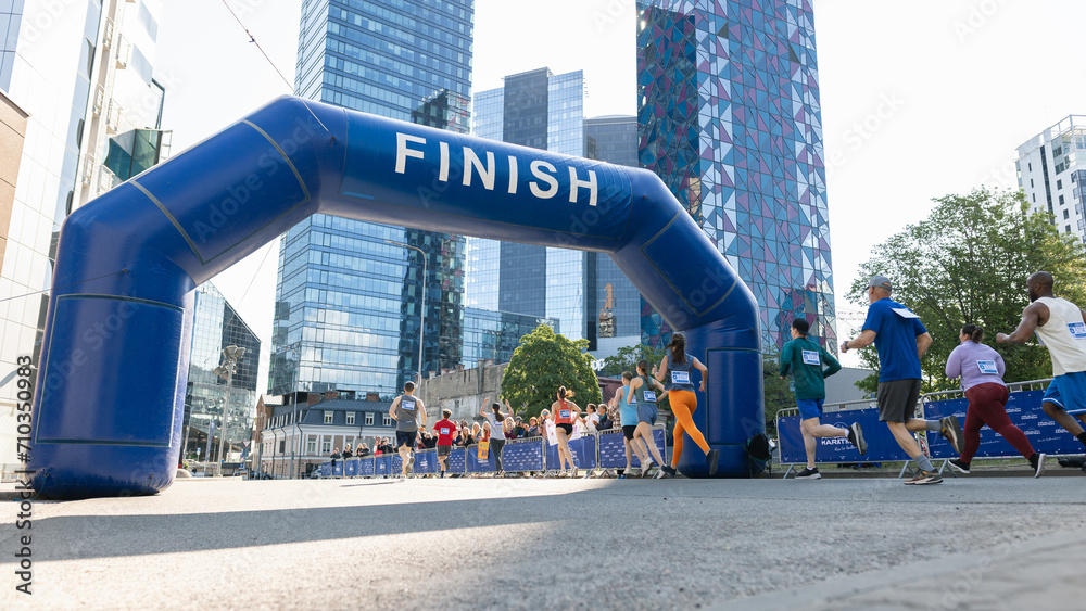 Smiling Group of People Participating in a City Marathon. Wide Shot of ...