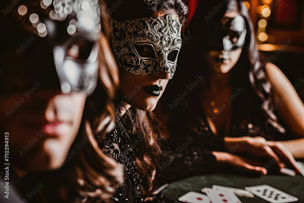 Elegant group of women wearing venetian masks at a mysterious and ...