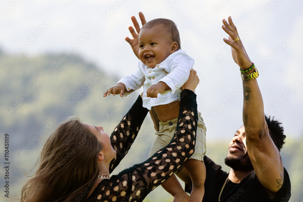 Mixed race family portrait. Happy multiracial family outside ...