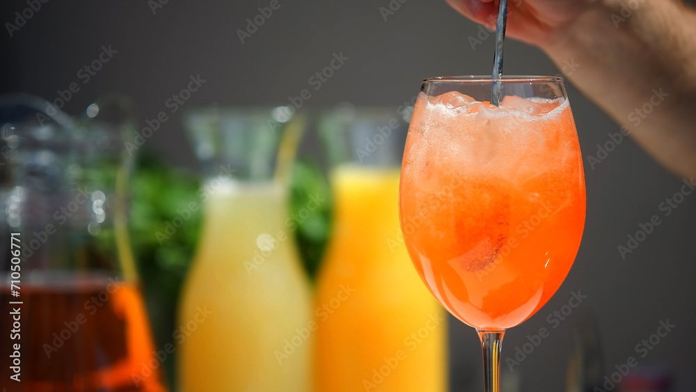 Champagne in an aperol spritz cocktail glass with orange slices ...