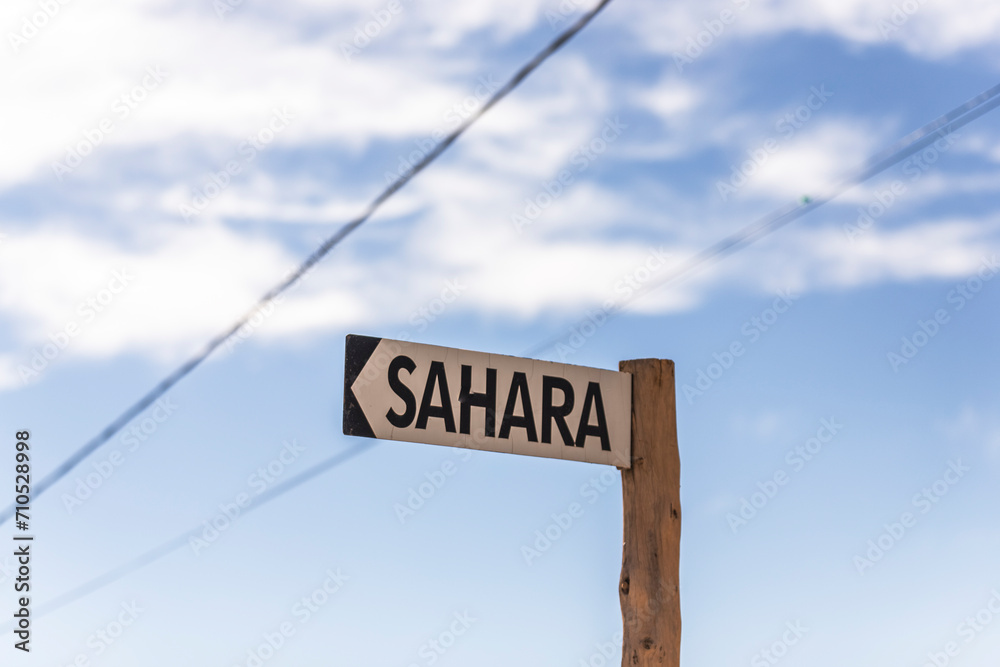View of a sign in Merzouga village, a berber village near the Sahara ...