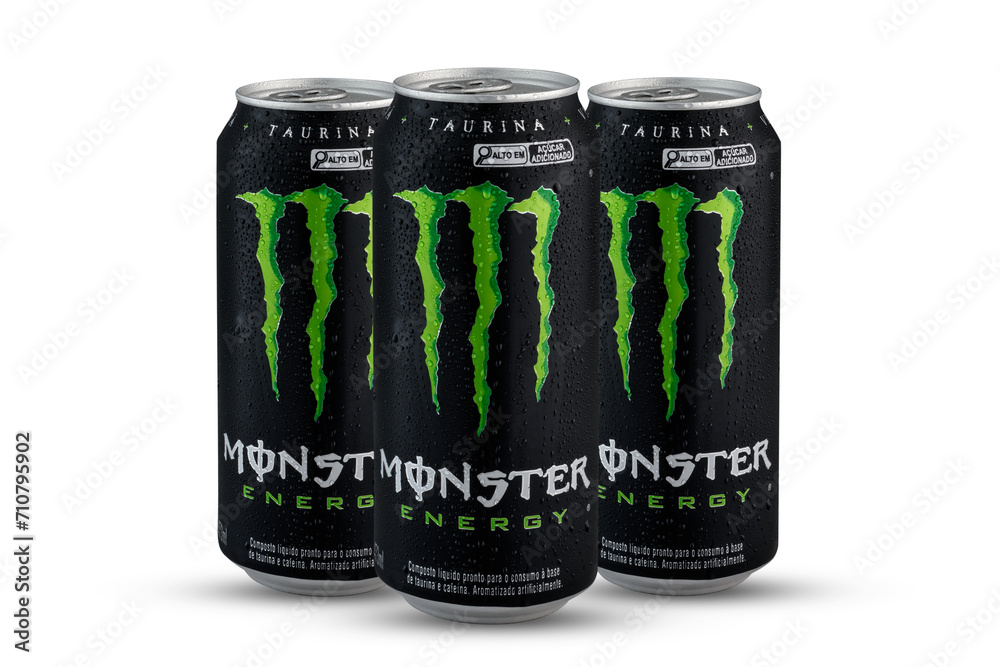 SÃO PAULO, BRAZIL - JANUARY 16, 2024 THREE CANS OF MONSTER ENERGY DRINK ...