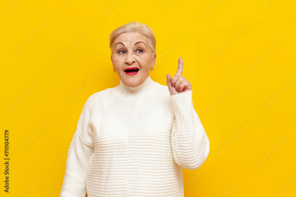 pensive old granny thinking plan and idea on yellow isolated background ...