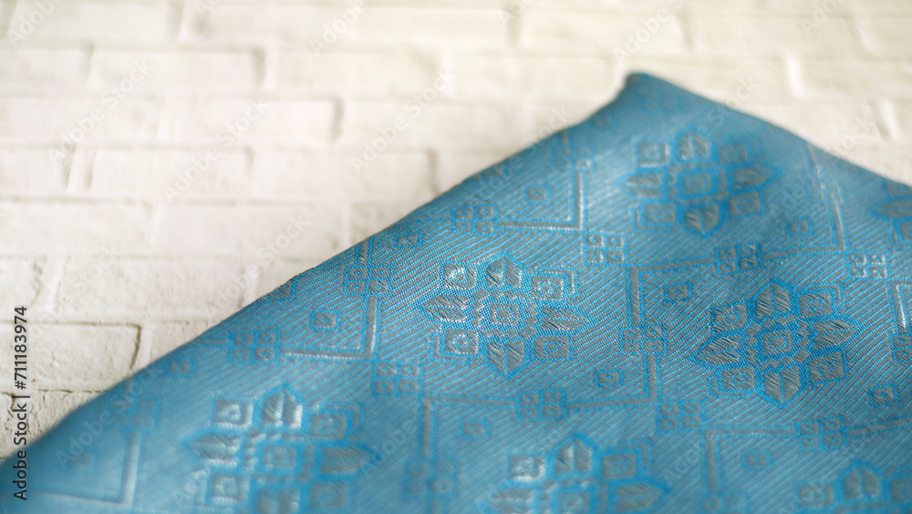 Songket or sungkit fabric. A tenun fabric that belongs to the brocade ...