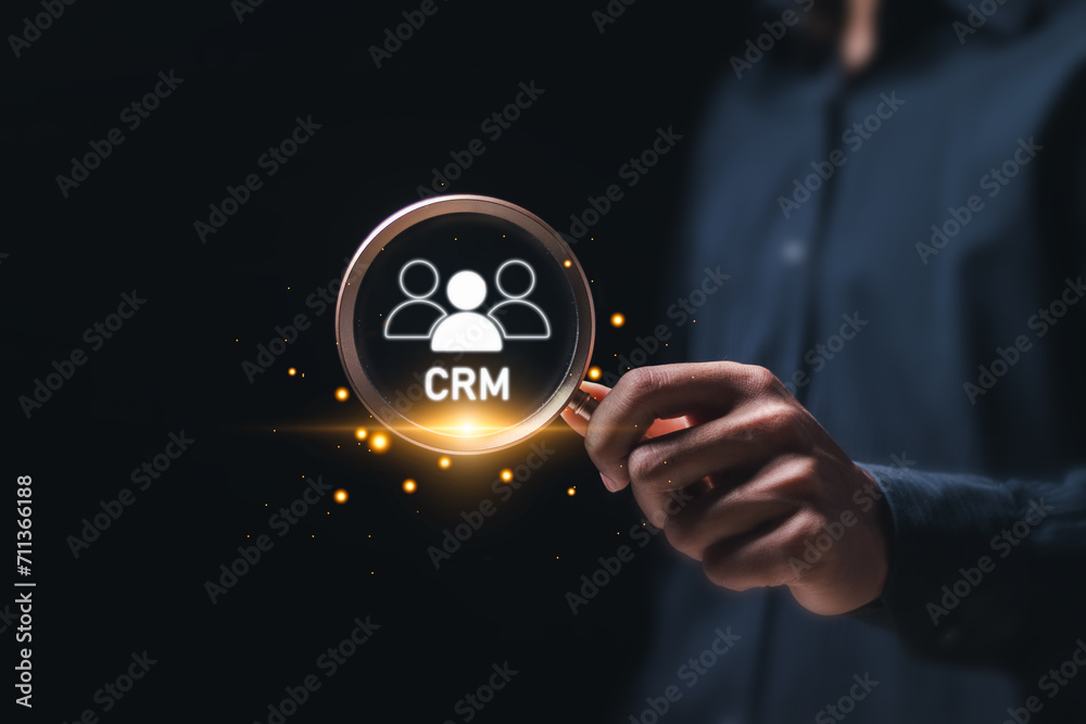 Customer relationship management concept. Person use magnifying glass ...