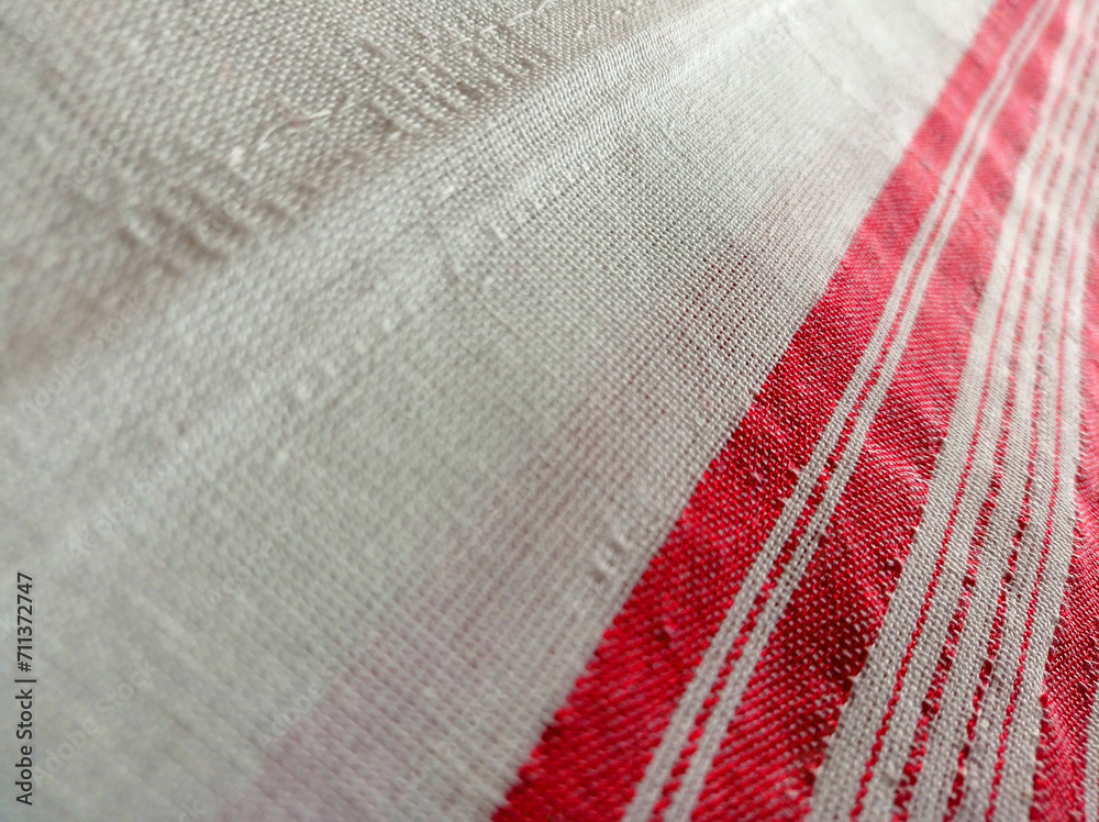 Gamosa or gamusa is a traditional textile pattern from Assam. It is a ...